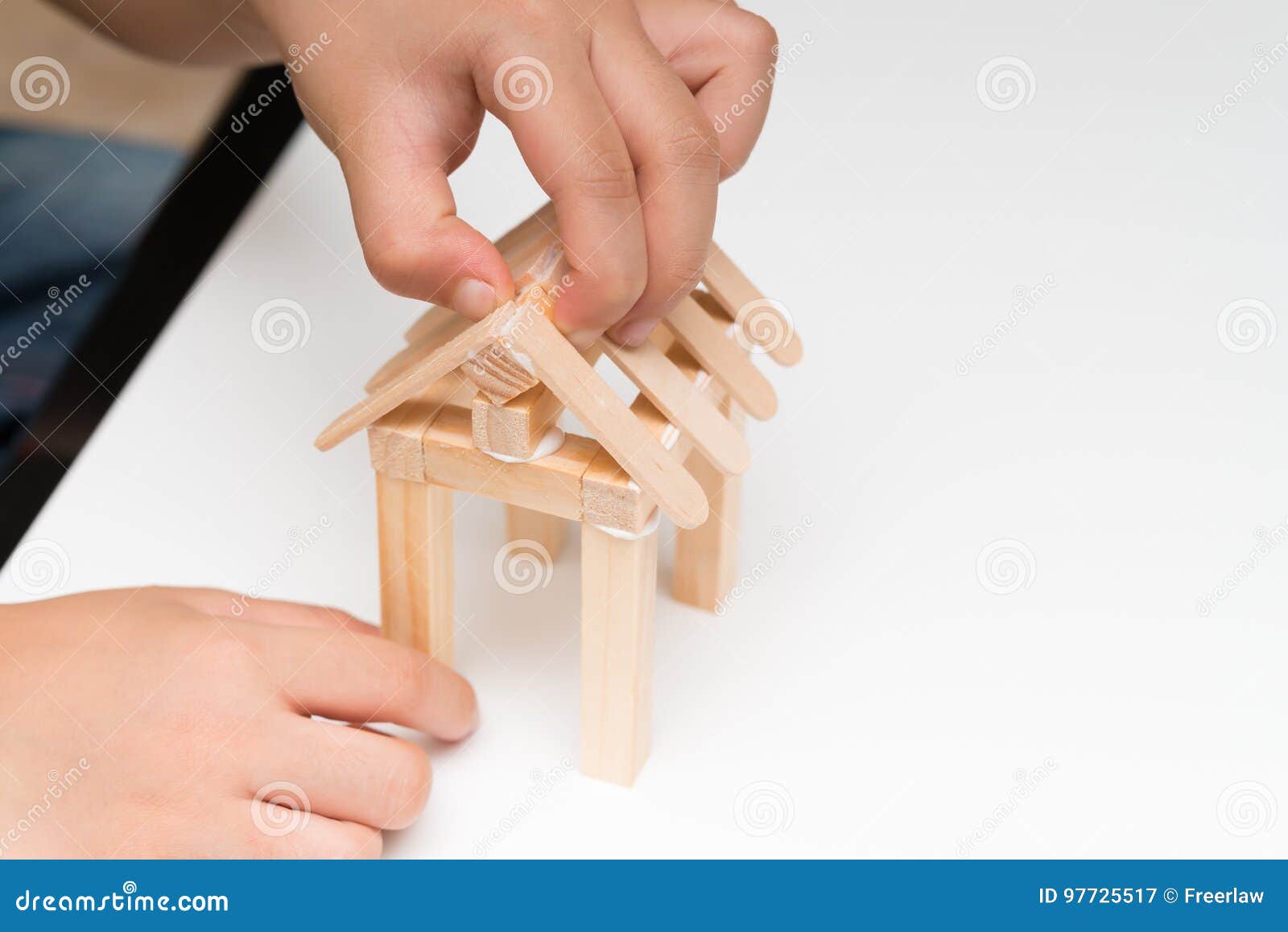 Kid making a house model stock image. Image of property - 97725517