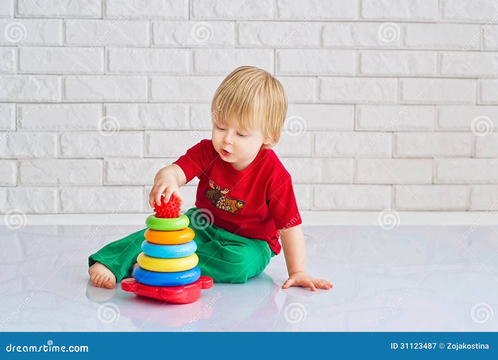 Kid and nesting blocks stock image. Image of portrait - 31123487
