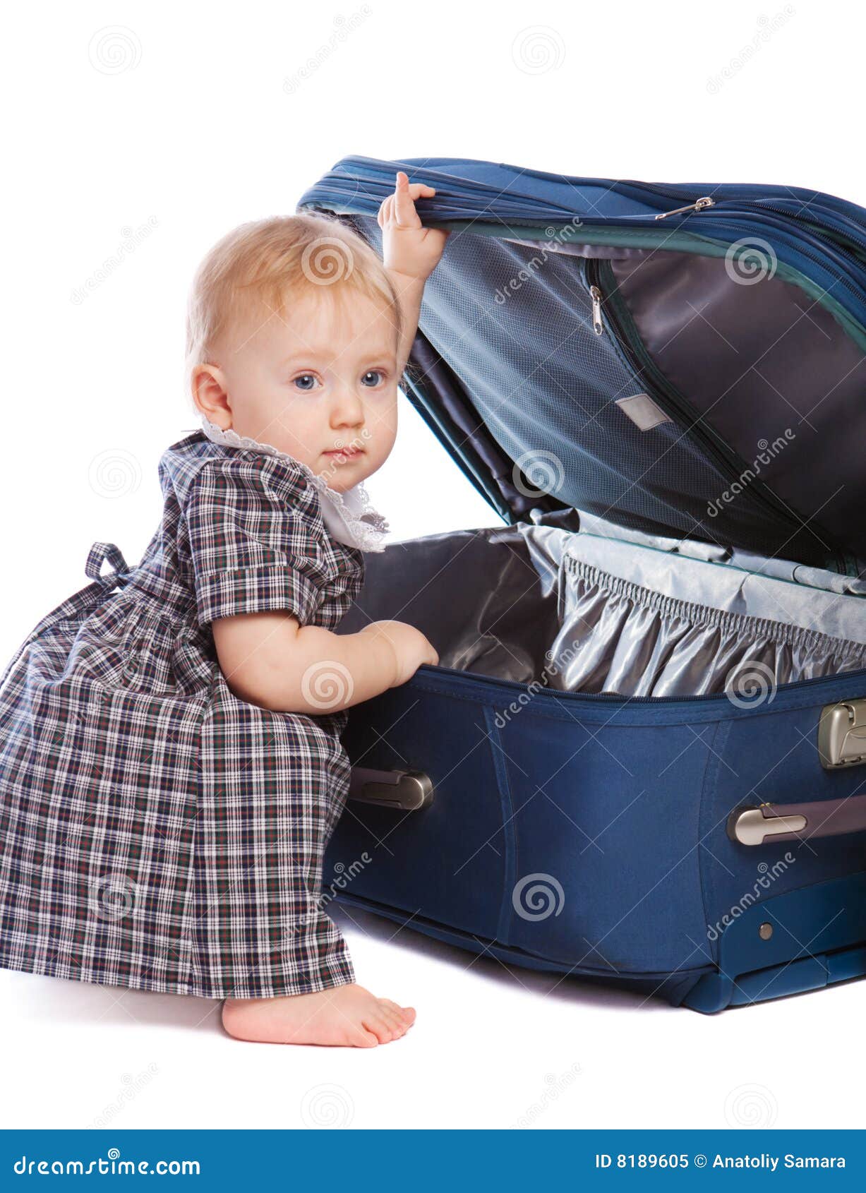 Kid opening a suitcase stock image. Image of isolated - 8189605