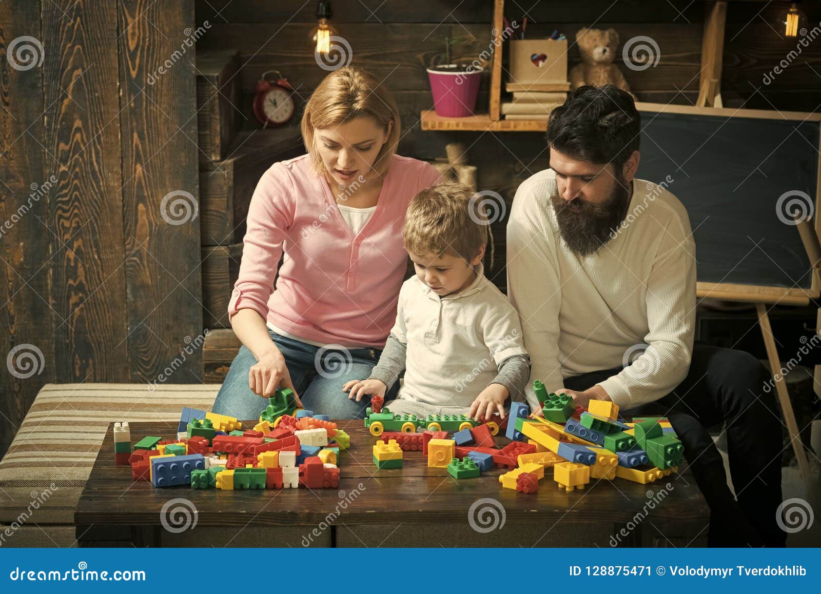 Kid with Parents Play with Plastic Blocks, Build Construction ...