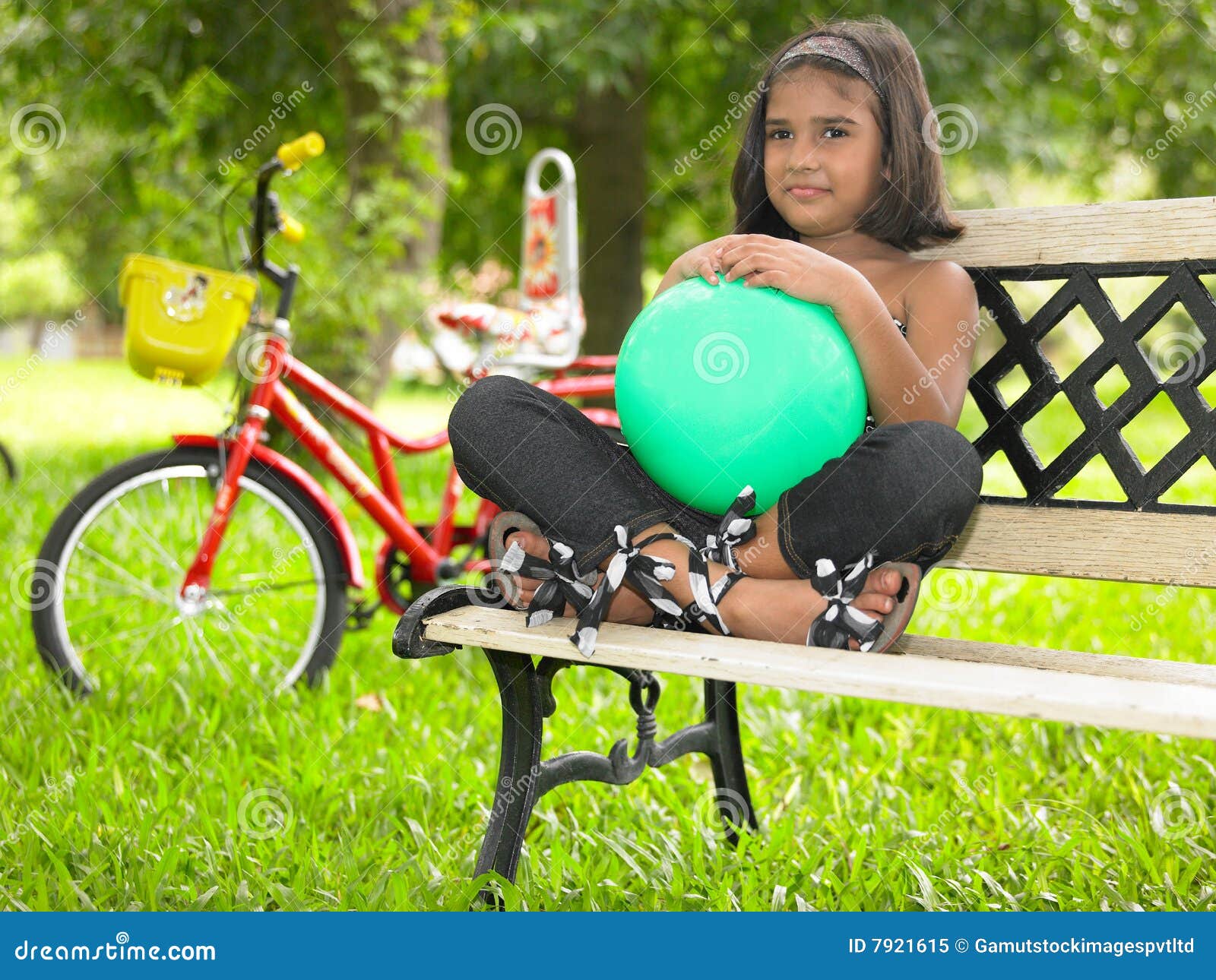 Kid in a Park Sitting on a Bench Stock Image - Image of hand, cycle ...