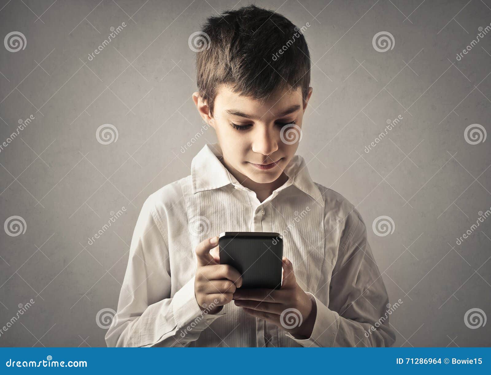 Kid with phone stock photo. Image of technology, mobile - 71286964