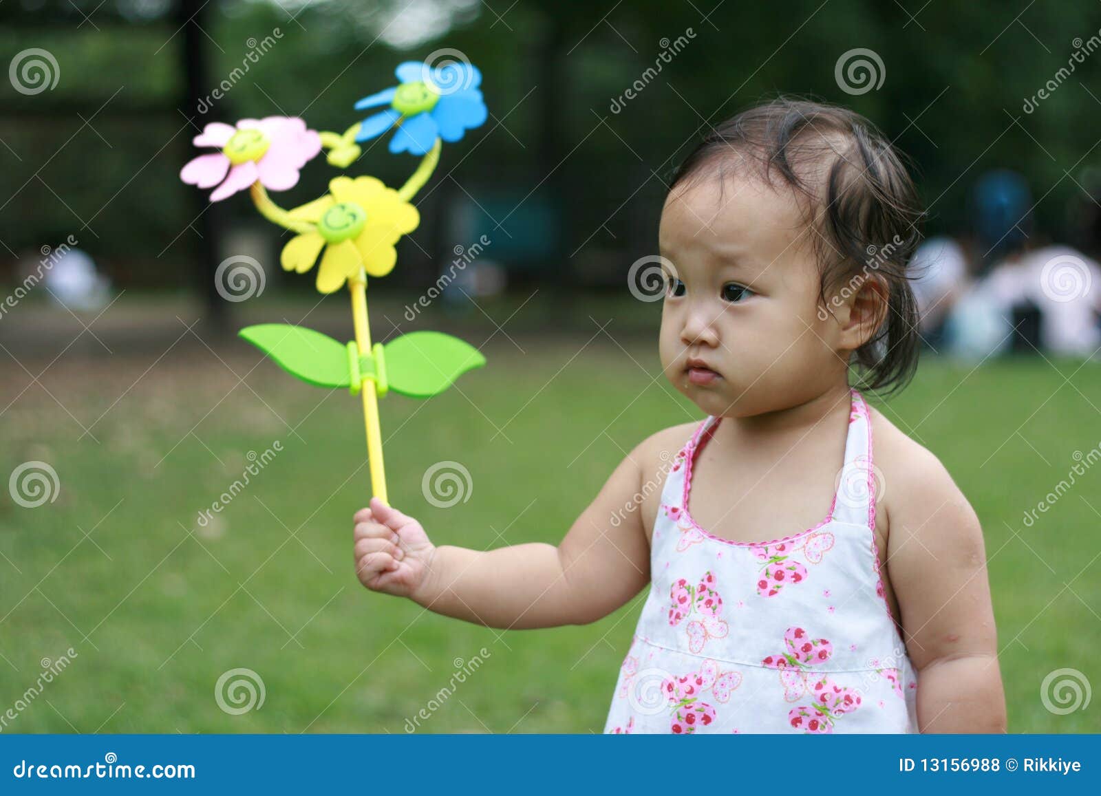 Kid with pinwheel stock photo. Image of children, toys - 13156988