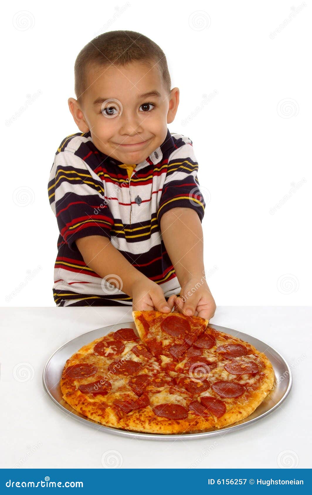 Kid and pizza stock image. Image of indulge, pepperoni - 6156257