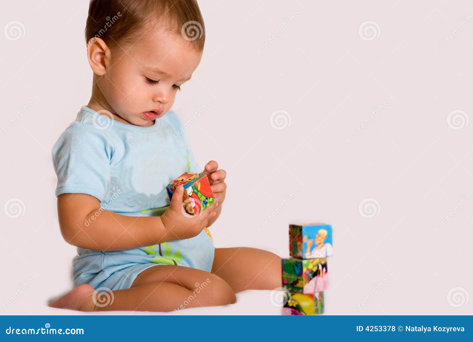 Kid play with bricks stock photo. Image of intelligence - 4253378