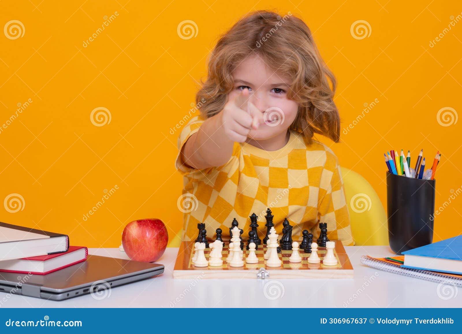Kid Play Chess on Isolated Studio Background. Kid Playing Chess. Clever Child Thinking about ...
