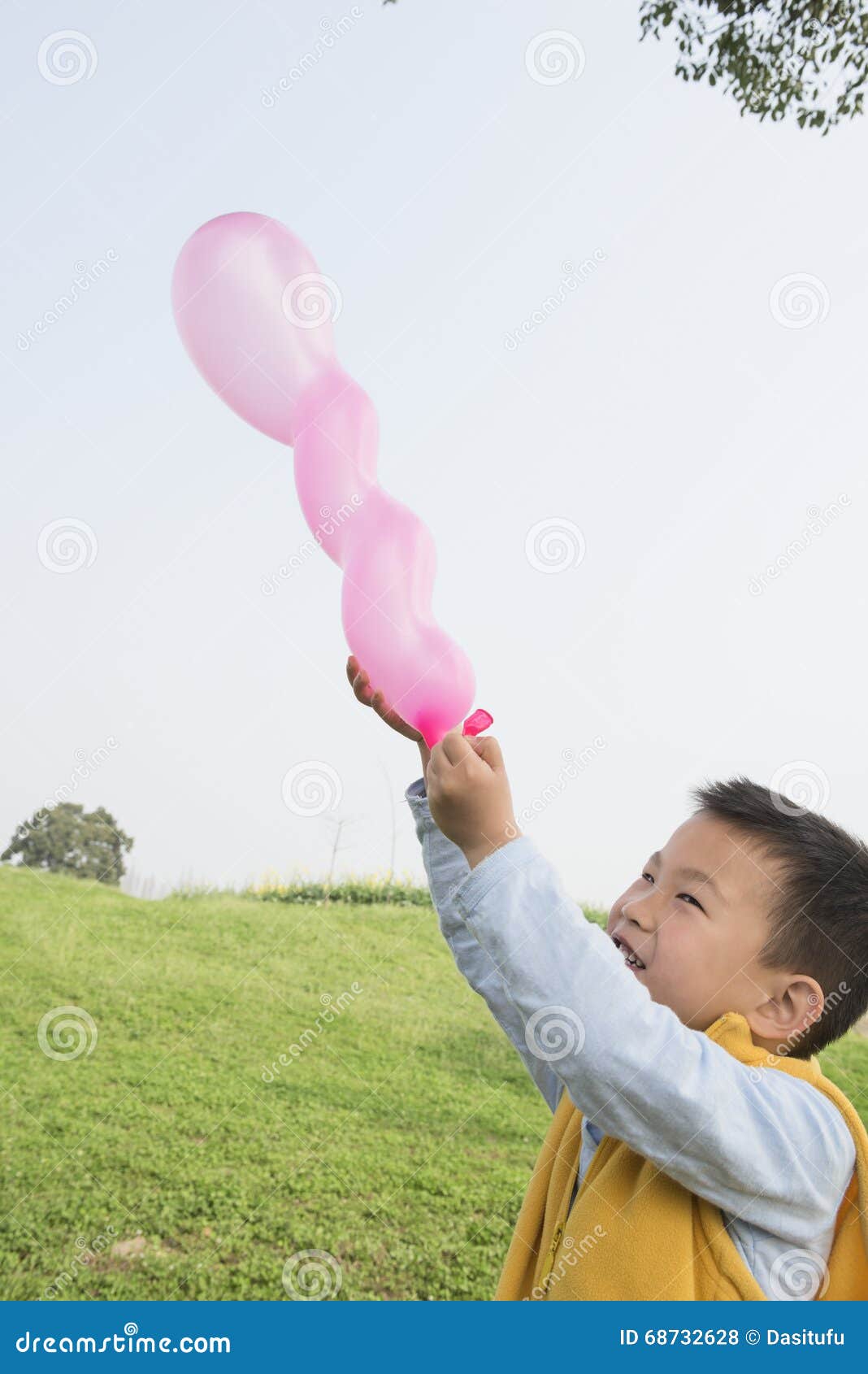 Kid playing balloon stock photo. Image of child, field - 68732628