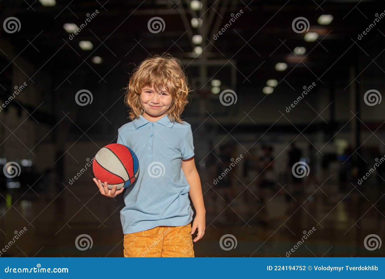 Kid Playing Basketball. Child Basketball Player at School. Stock Photo ...