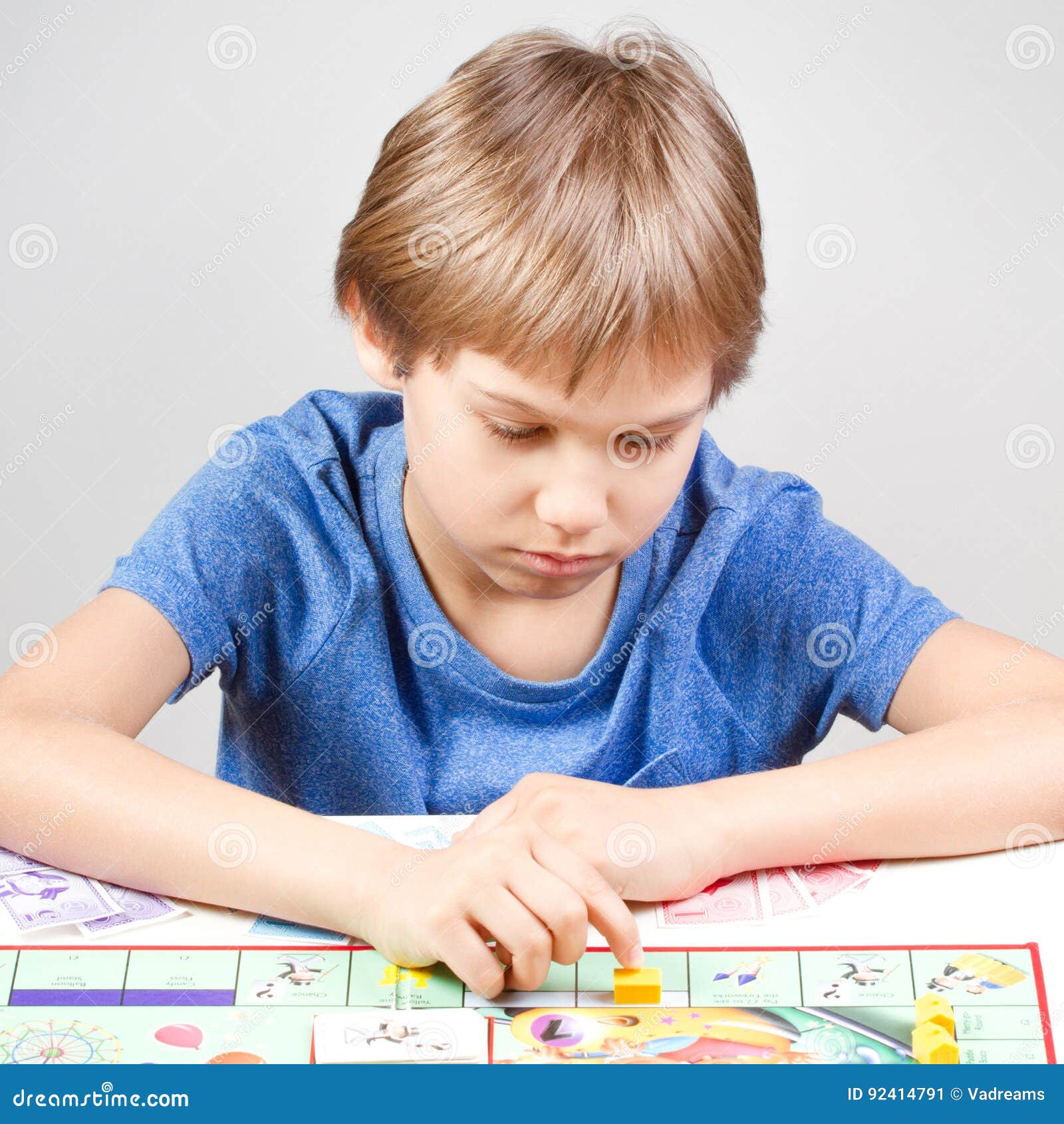 Kid playing board game stock image. Image of concept - 92414791