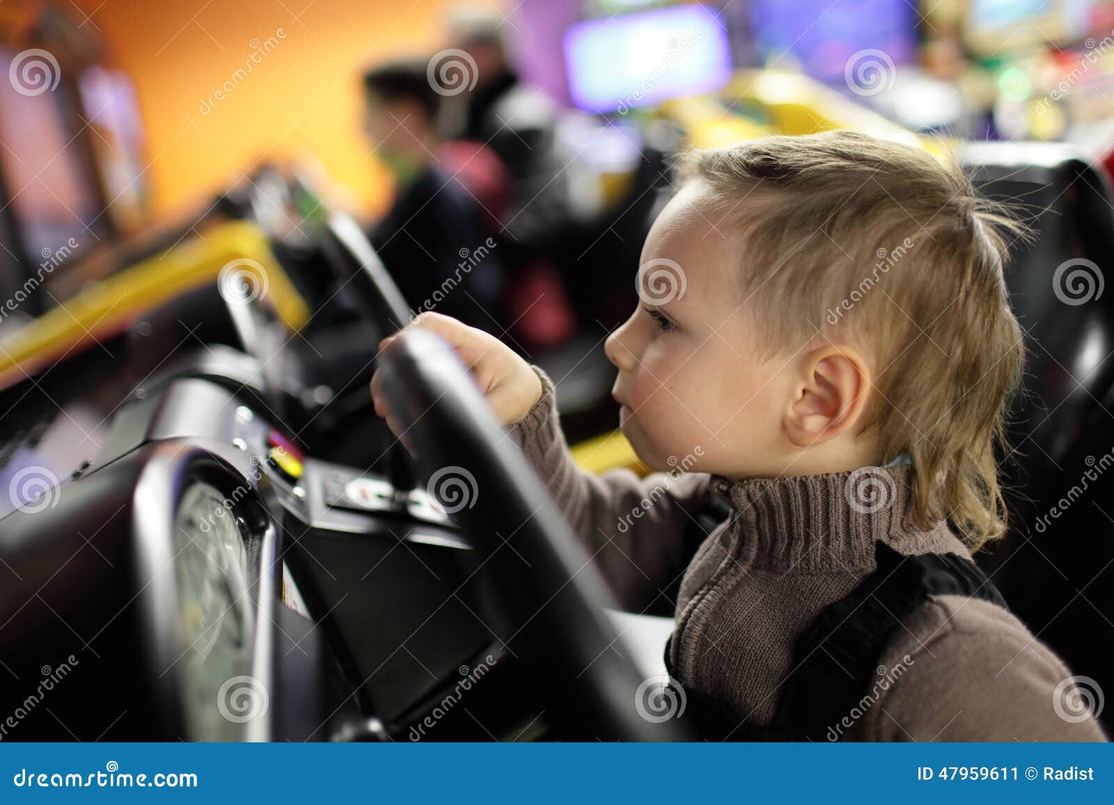 Kid Playing with Car Simulator Stock Image - Image of indoor, child ...
