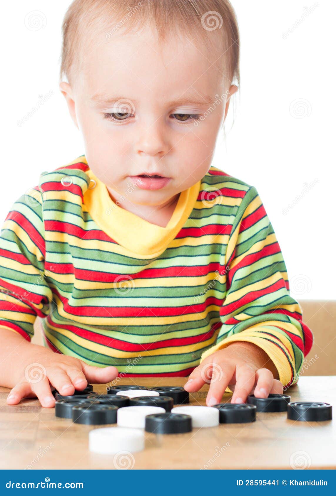 Kid playing checkers. stock image. Image of home, face - 28595441
