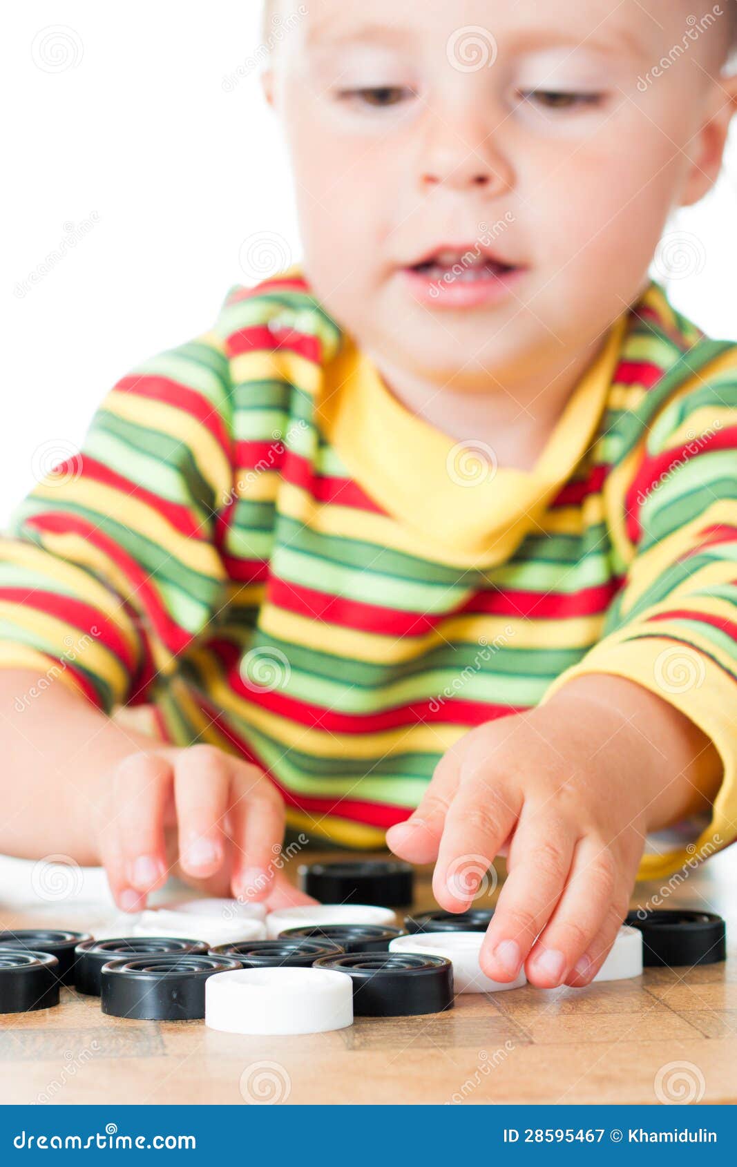 Kid playing checkers. stock image. Image of entertainment - 28595467