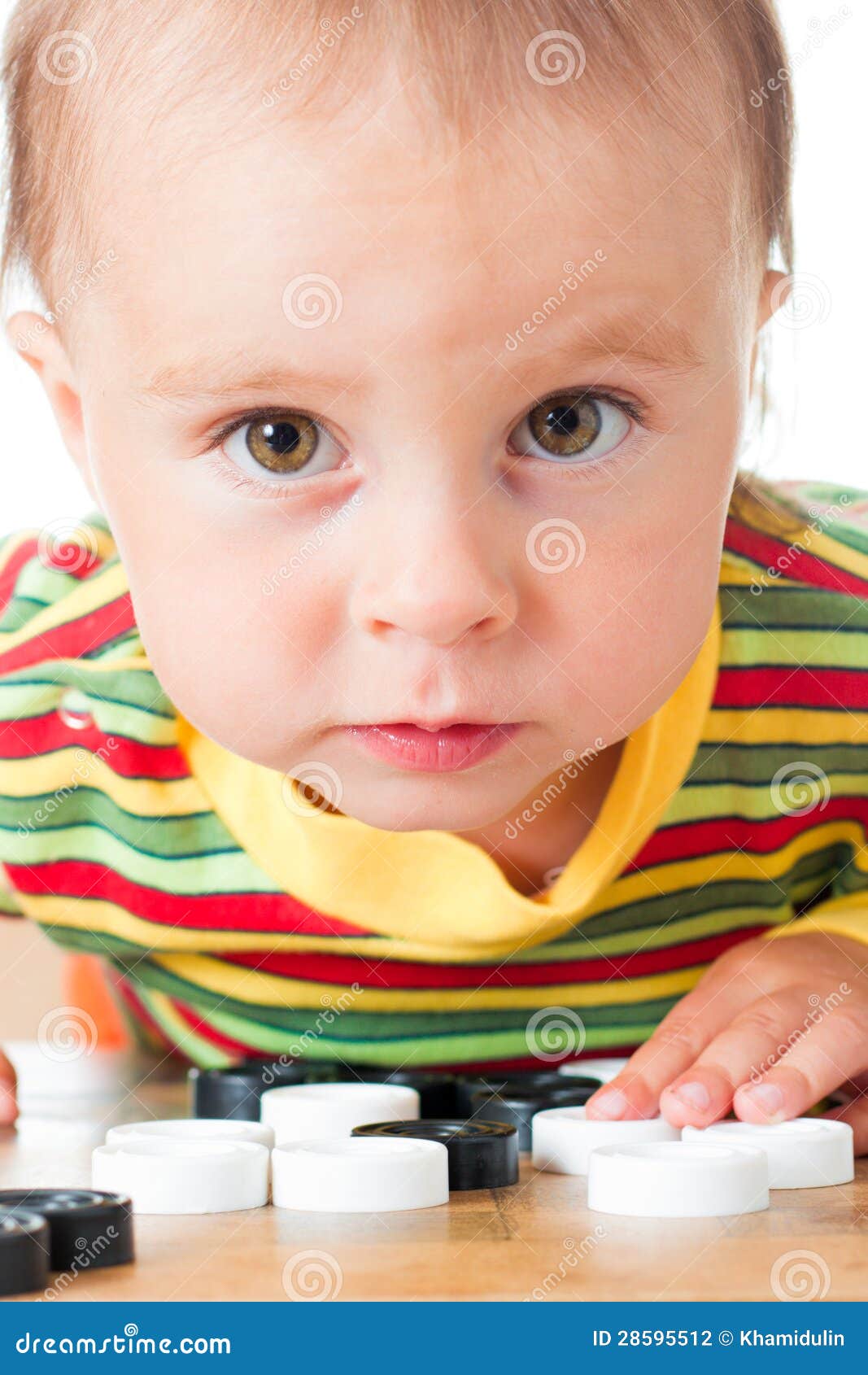 Kid playing checkers. stock photo. Image of cute, checkers - 28595512