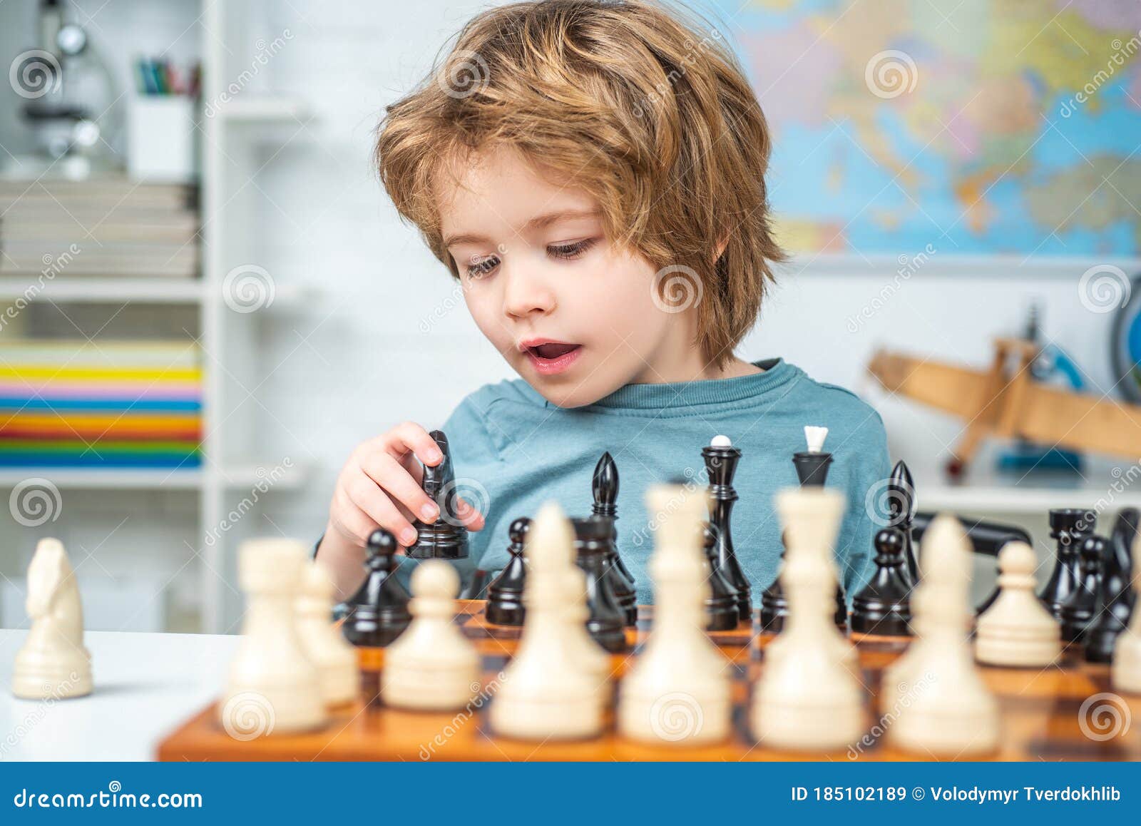Kid Playing Chess. Thinking Kid. Little Clever Boy Thinking about Chess ...