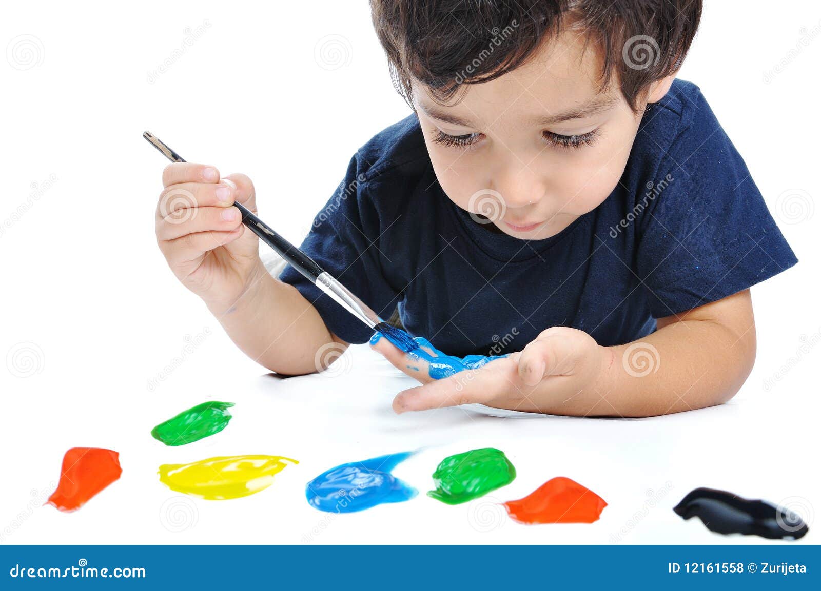 Kid playing with colors stock photo. Image of closeup - 12161558