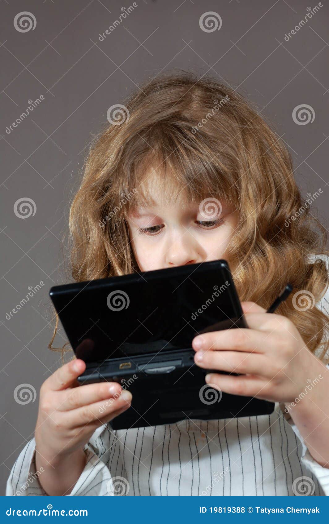 Kid playing computer game stock photo. Image of console - 19819388