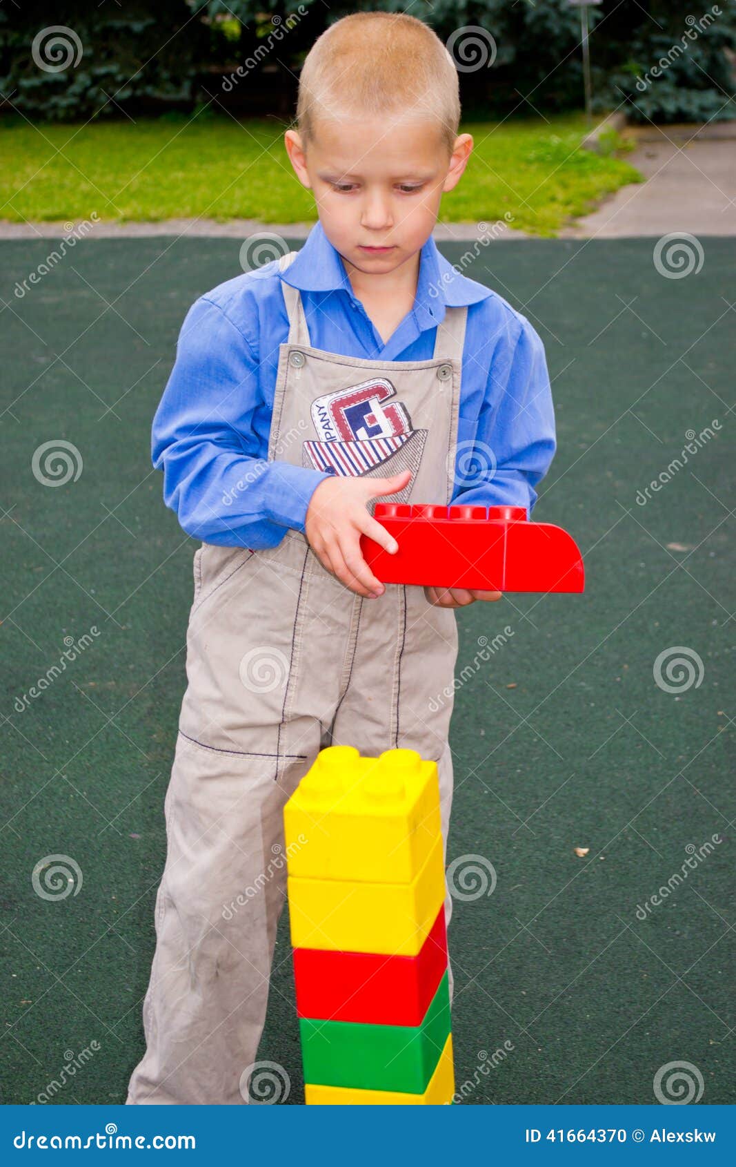 Kid playing with cubes stock photo. Image of block, adorable - 41664370