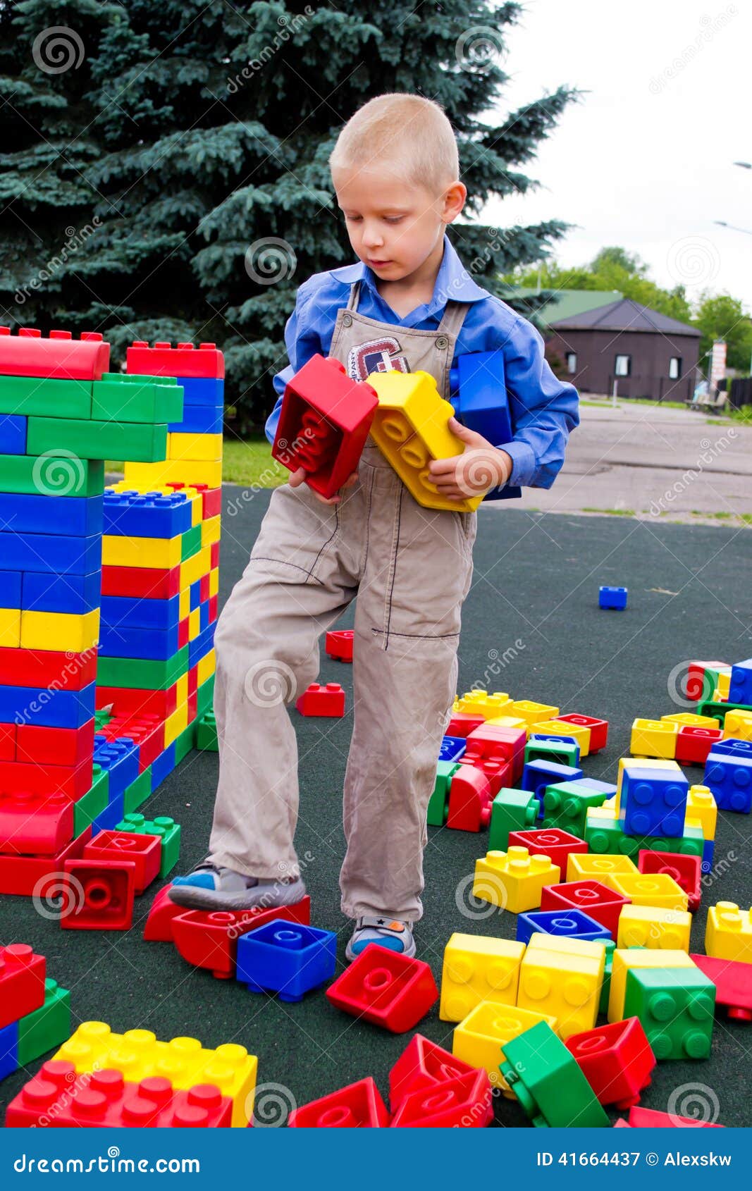 Kid playing with cubes stock image. Image of assembly - 41664437