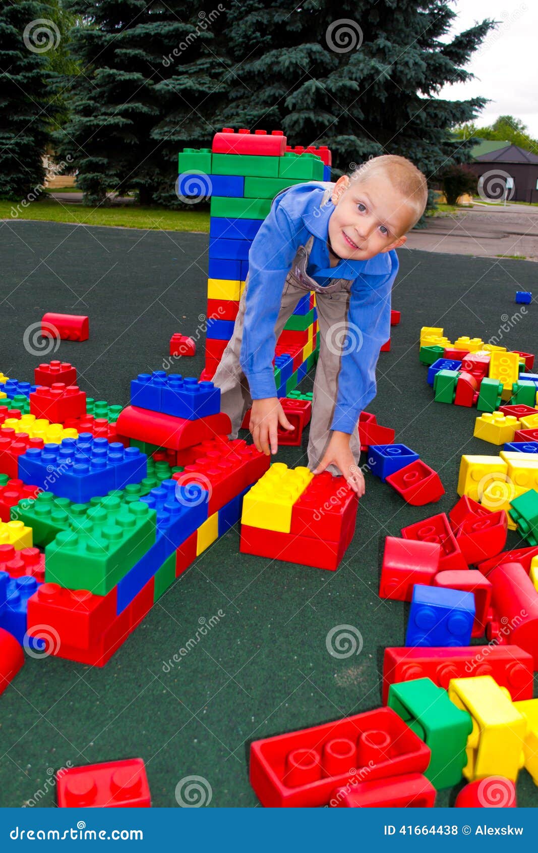 Kid playing with cubes stock photo. Image of construction - 41664438