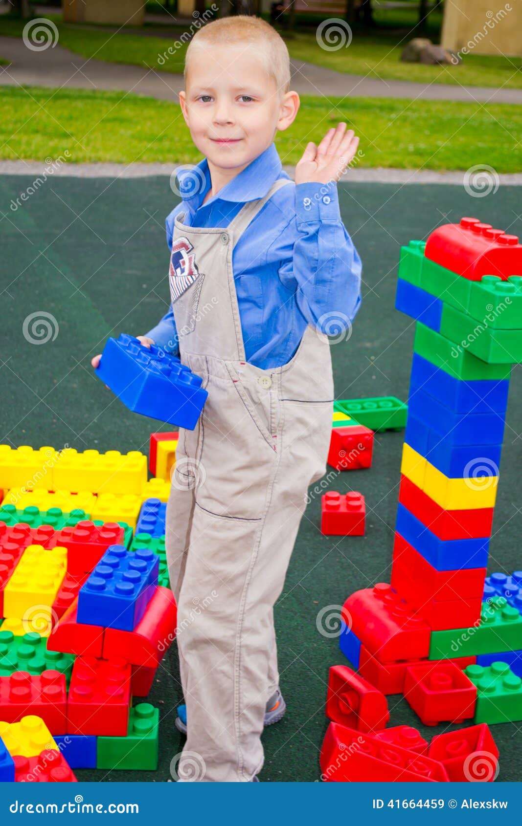 Kid playing with cubes stock image. Image of cubes, block - 41664459