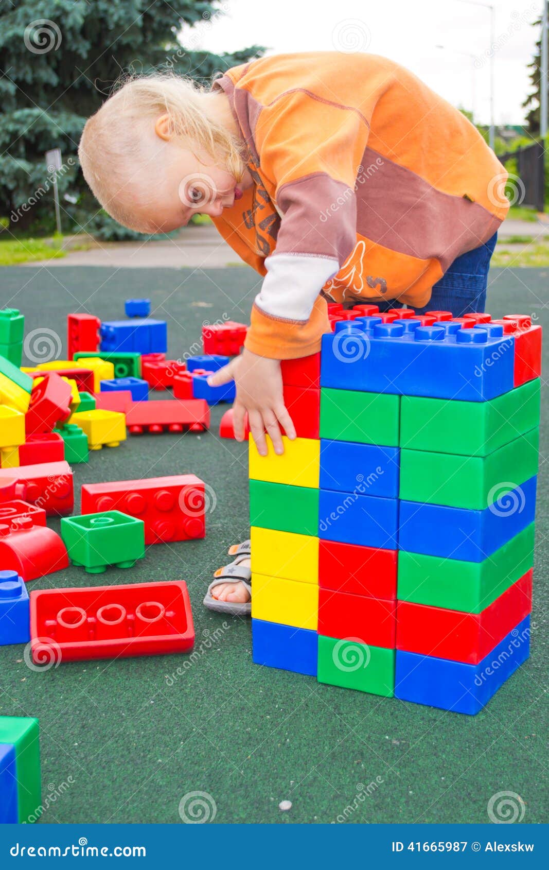 Kid playing with cubes stock image. Image of concept - 41665987