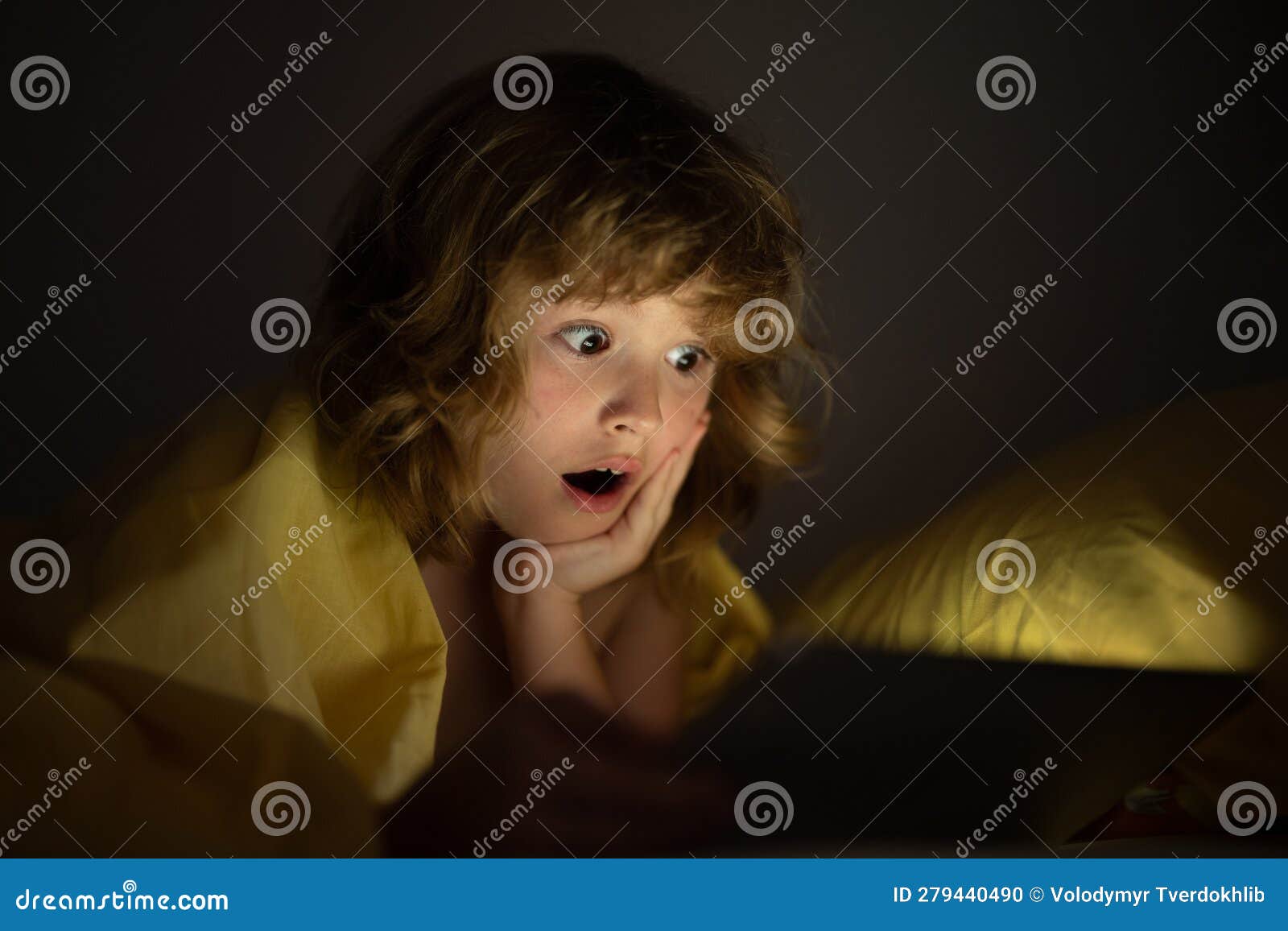 Kid Playing on a Digital Tablet. Kid Using Tablet for Gaming and Online ...