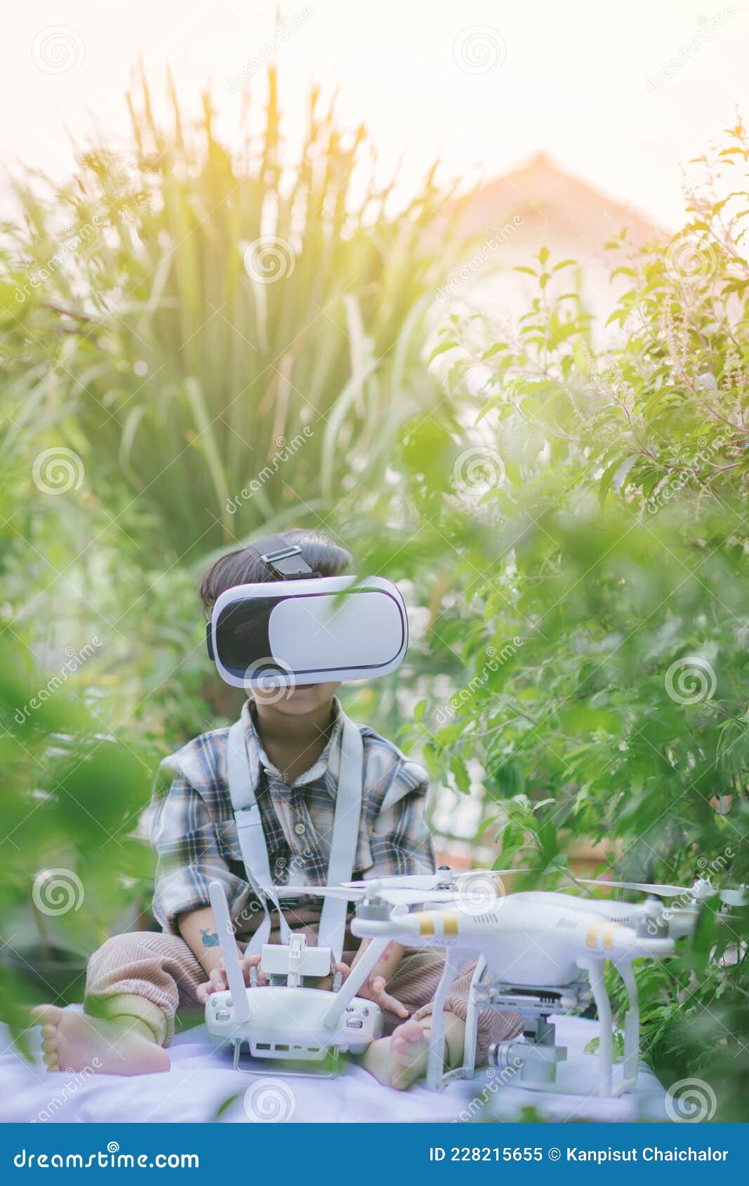 Kid Playing Drone. Little Pilot Using Drone Remote Controller. Young ...