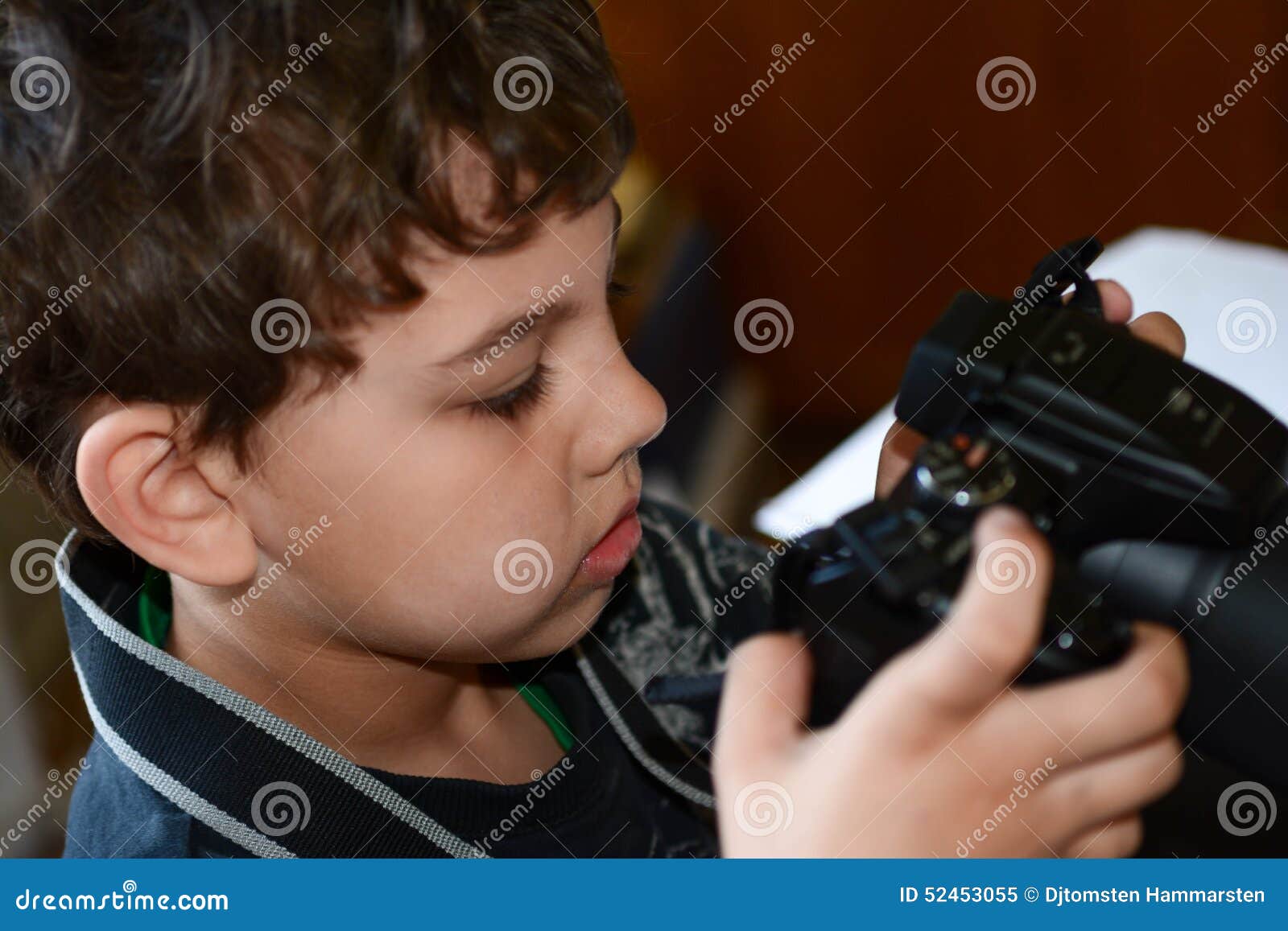 Kid Playing with His Camera Stock Image - Image of latin, camera: 52453055