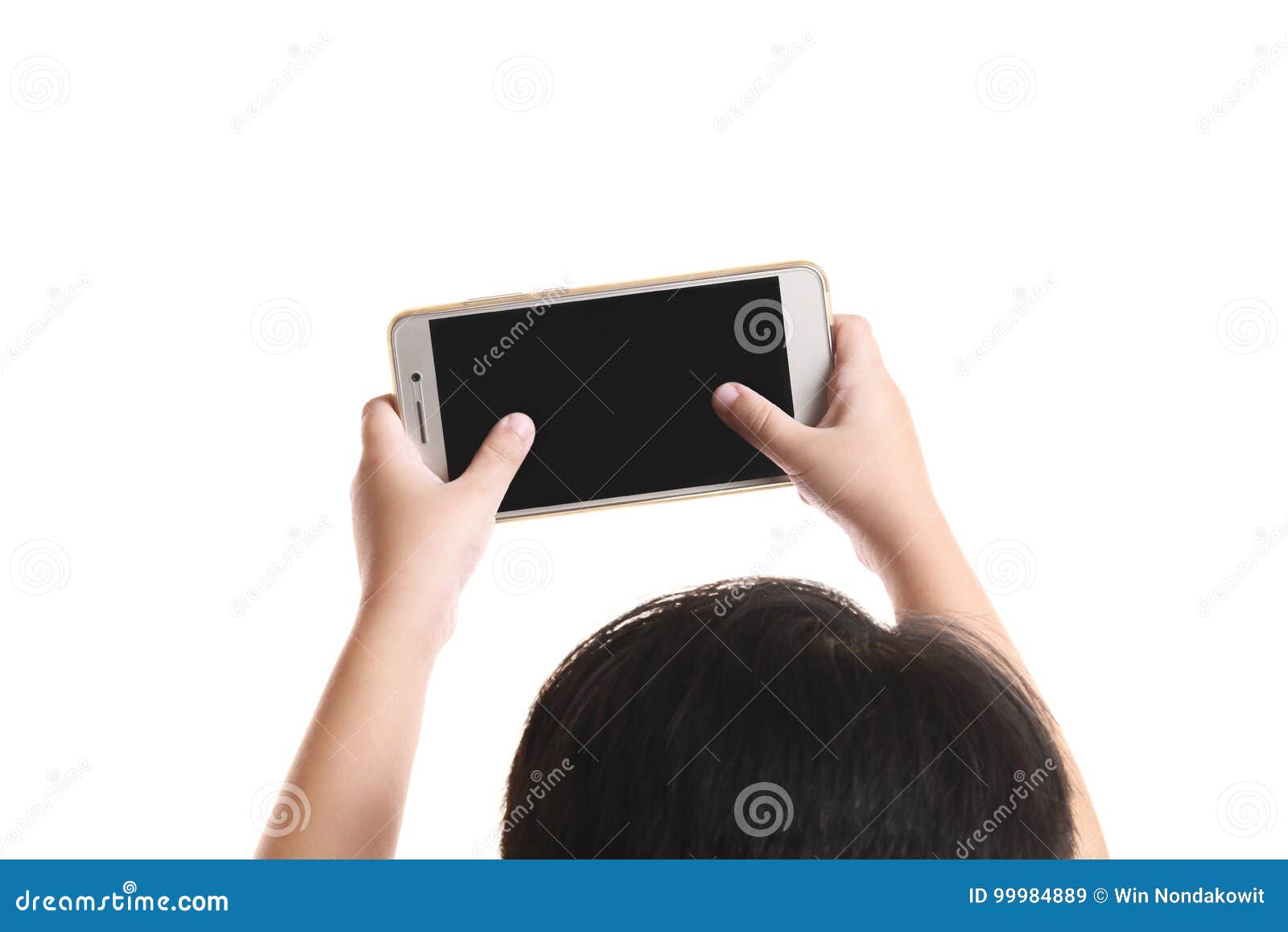 Kid playing mobile phone stock image. Image of phone - 99984889