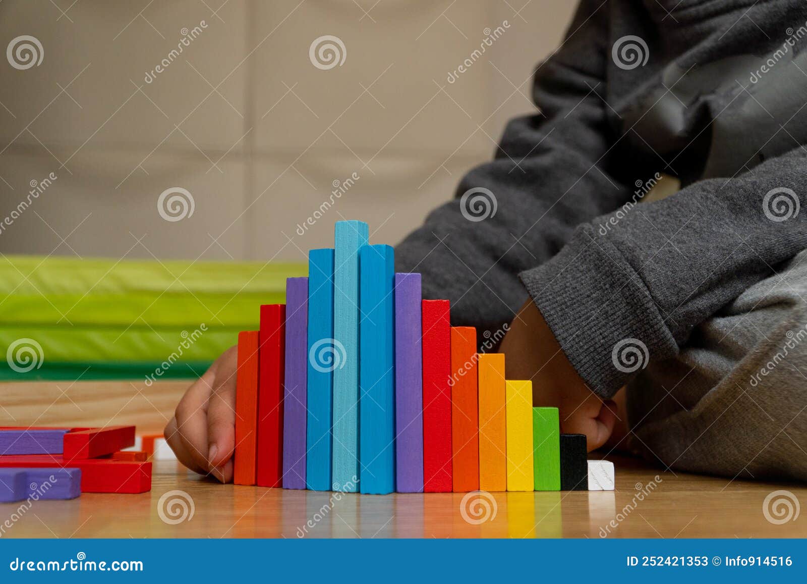 Child Learning Mathematics with Montessori Waldorf Math Rods Stock ...