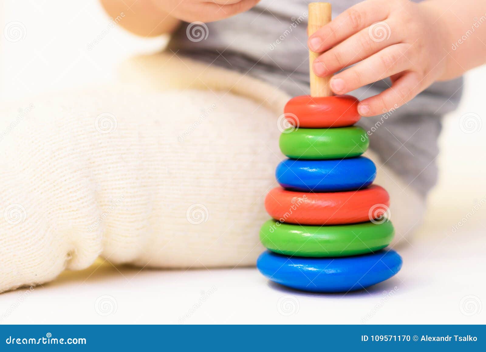 The Kid is Playing with the Pyramid in the Room Stock Photo - Image of ...