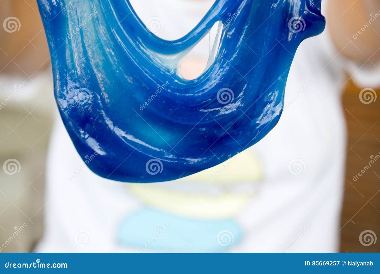 Kid playing slime stock image. Image of blue, happy, playing - 85669257