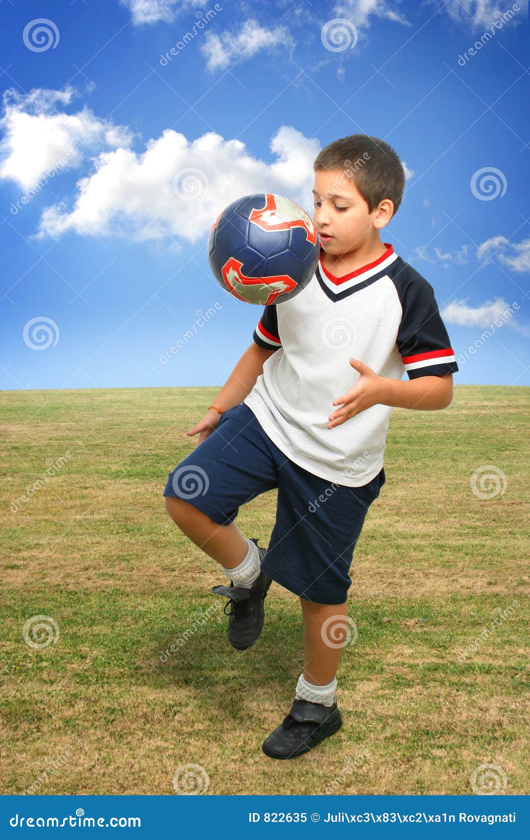 Kid playing soccer outside stock image. Image of shot, competition - 822635