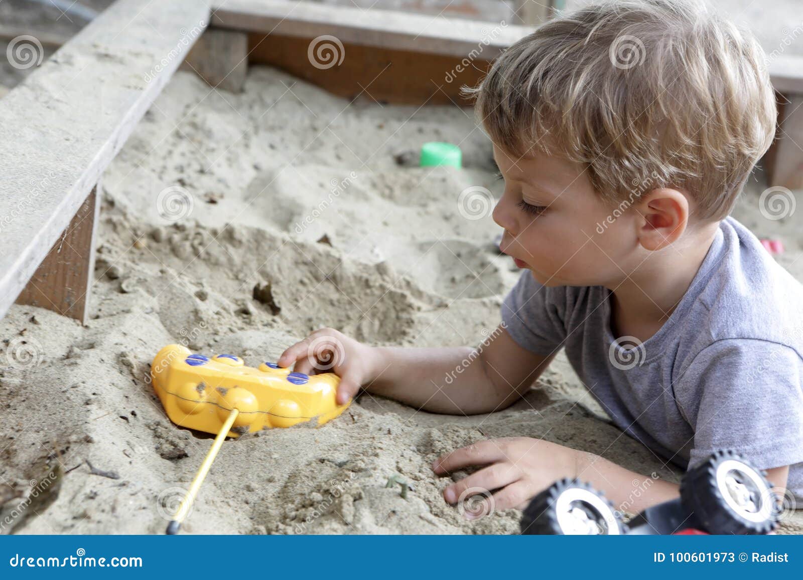 Kid in sandbox stock image. Image of casual, park, childhood - 100601973