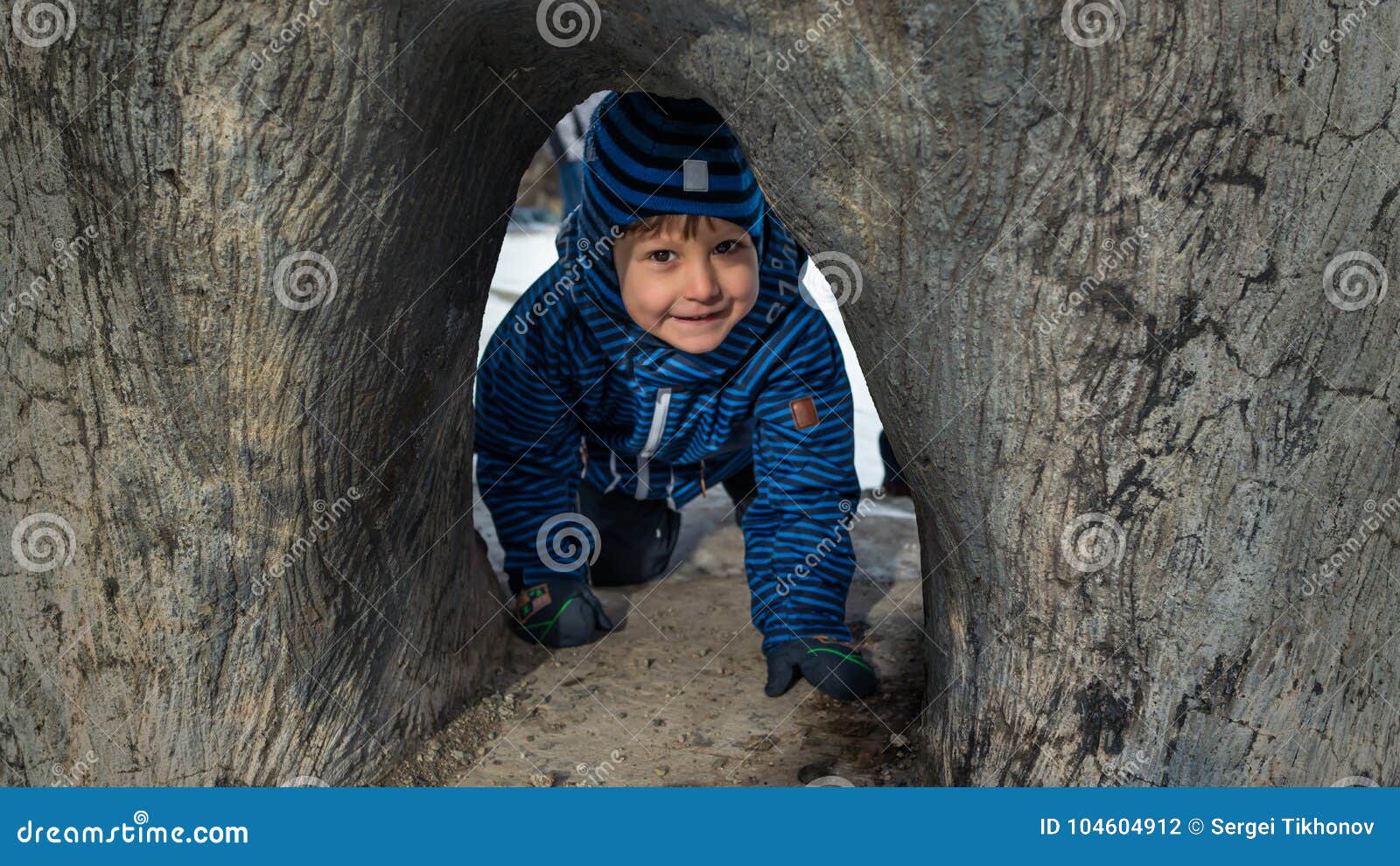 Kid Playing Under the Tree in Winter Time Stock Photo - Image of mixed ...