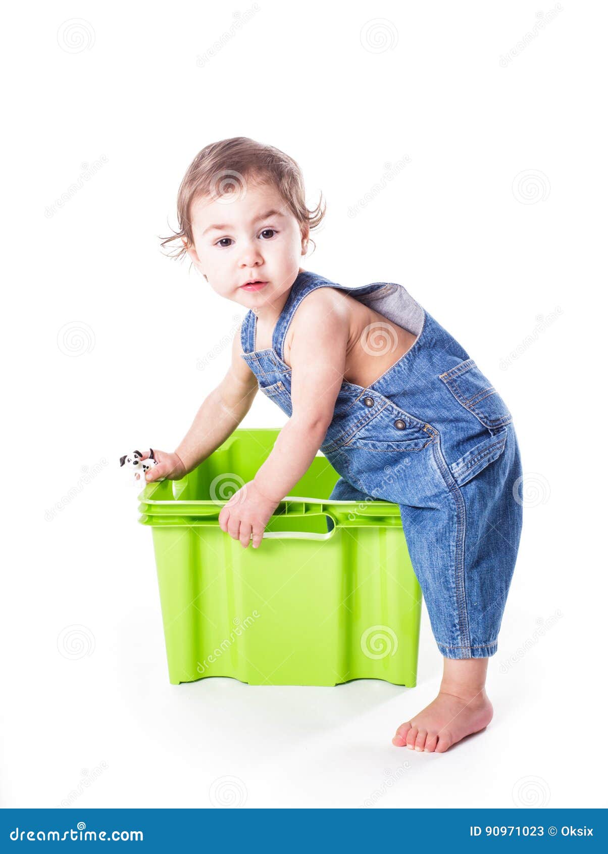 Kid plays with container stock image. Image of container - 90971023
