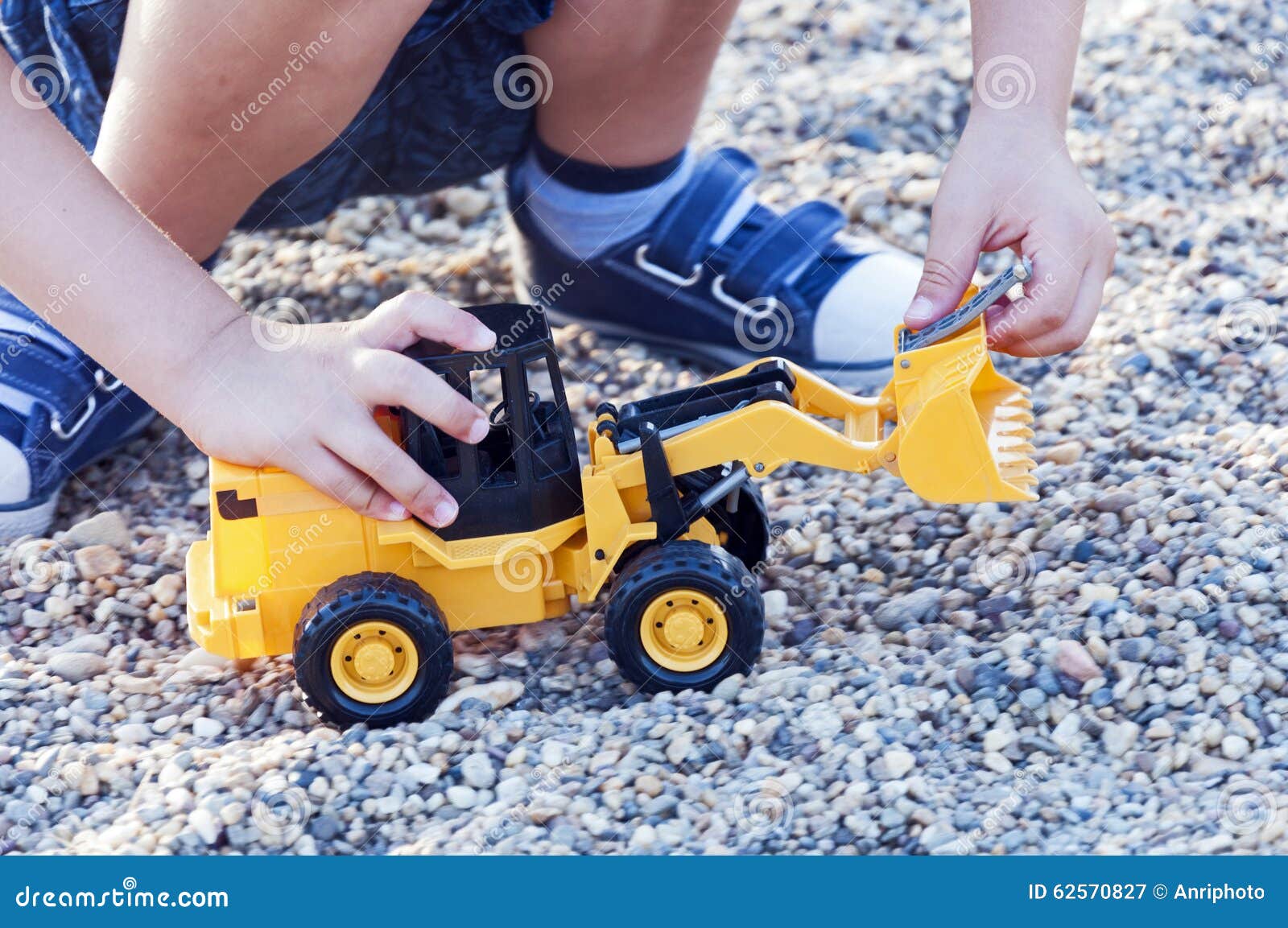 Kid Plays with Toy Excavator Stock Image - Image of child, digger: 62570827