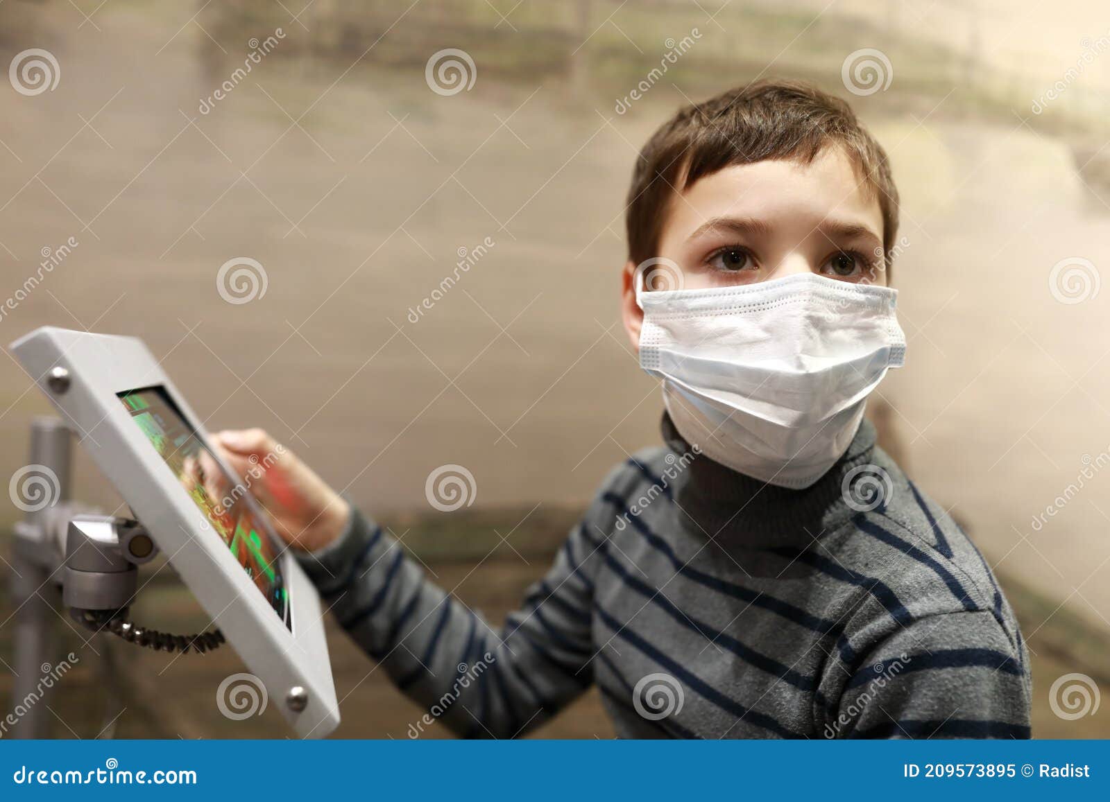 Kid in Protective Mask Uses Touch Screen Stock Image - Image of mask ...