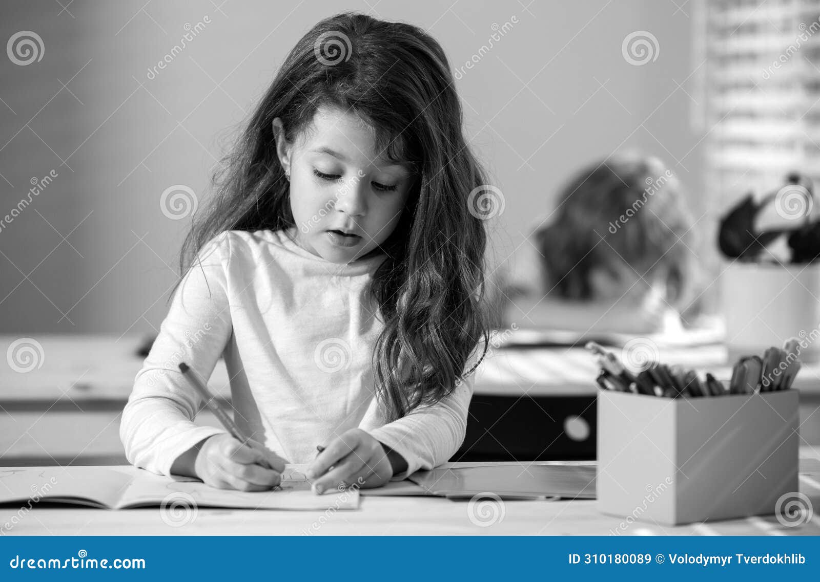 Kid Pupil is Drawing in Classroom at School. Stock Image - Image of ...