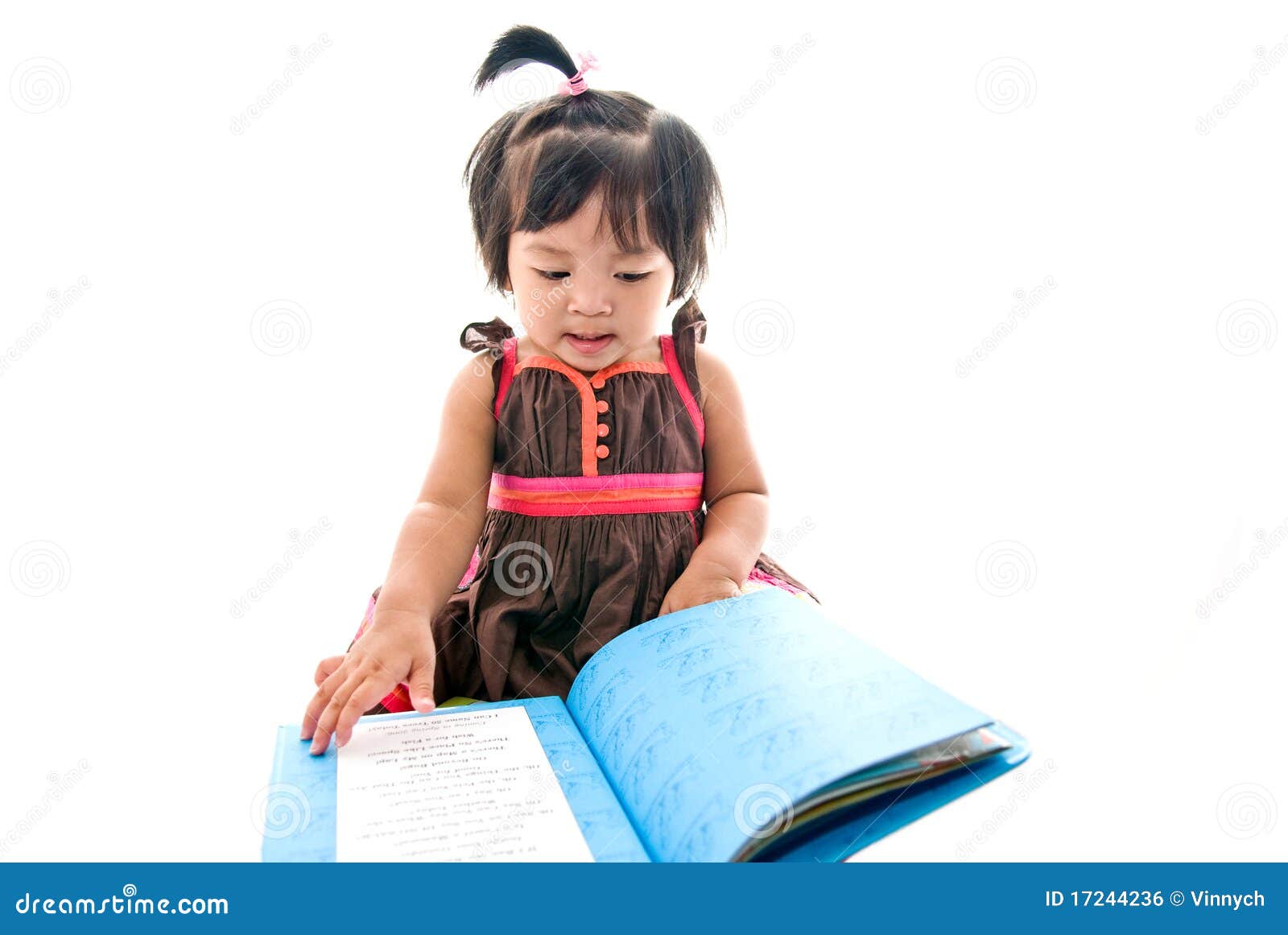 The kid reading a big book stock photo. Image of sweet - 17244236