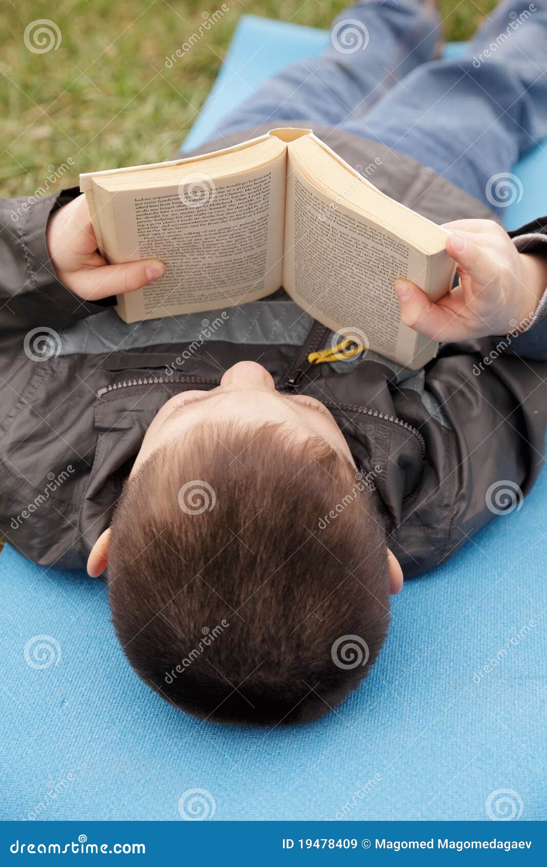 Kid reading book stock image. Image of person, outdoors - 19478409
