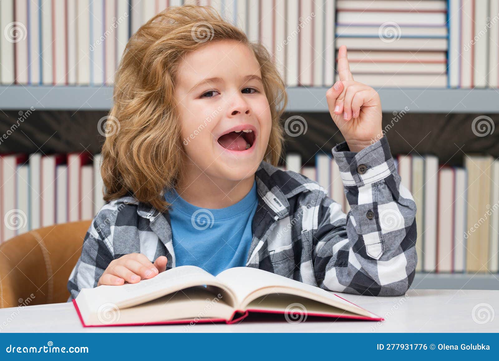 Kid Reading Book in a Book Store or Library, Stock Photo - Image of ...