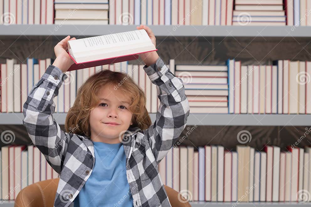 Kid Reading Book in a Book Store or Library, Stock Image - Image of ...