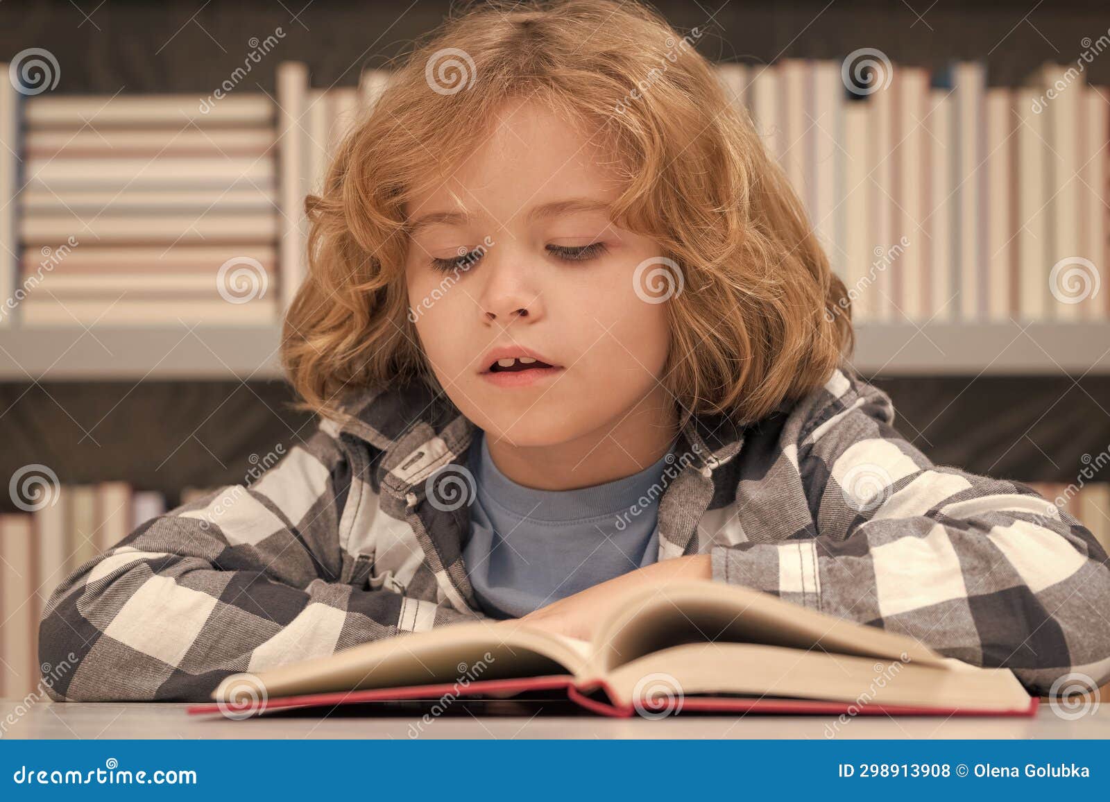 Kid Reading Book in a Book Store or Library, Stock Photo - Image of ...