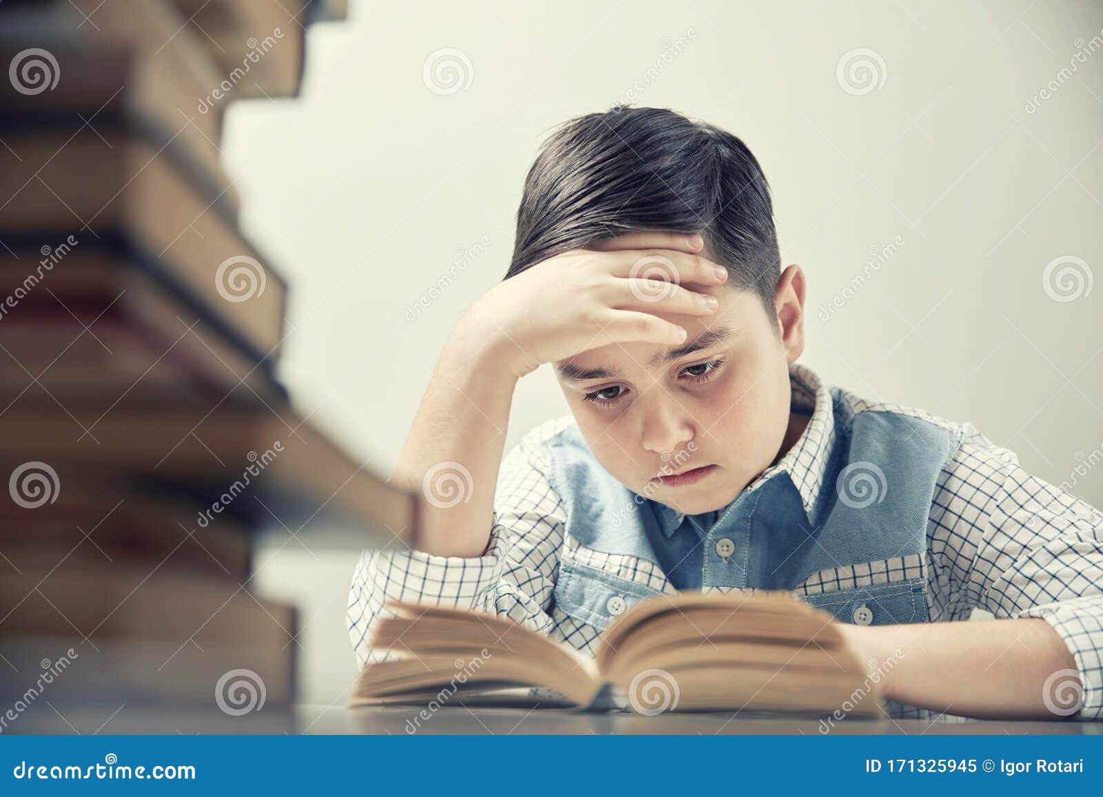 Kid reading books stock image. Image of stress, unhappy - 171325945