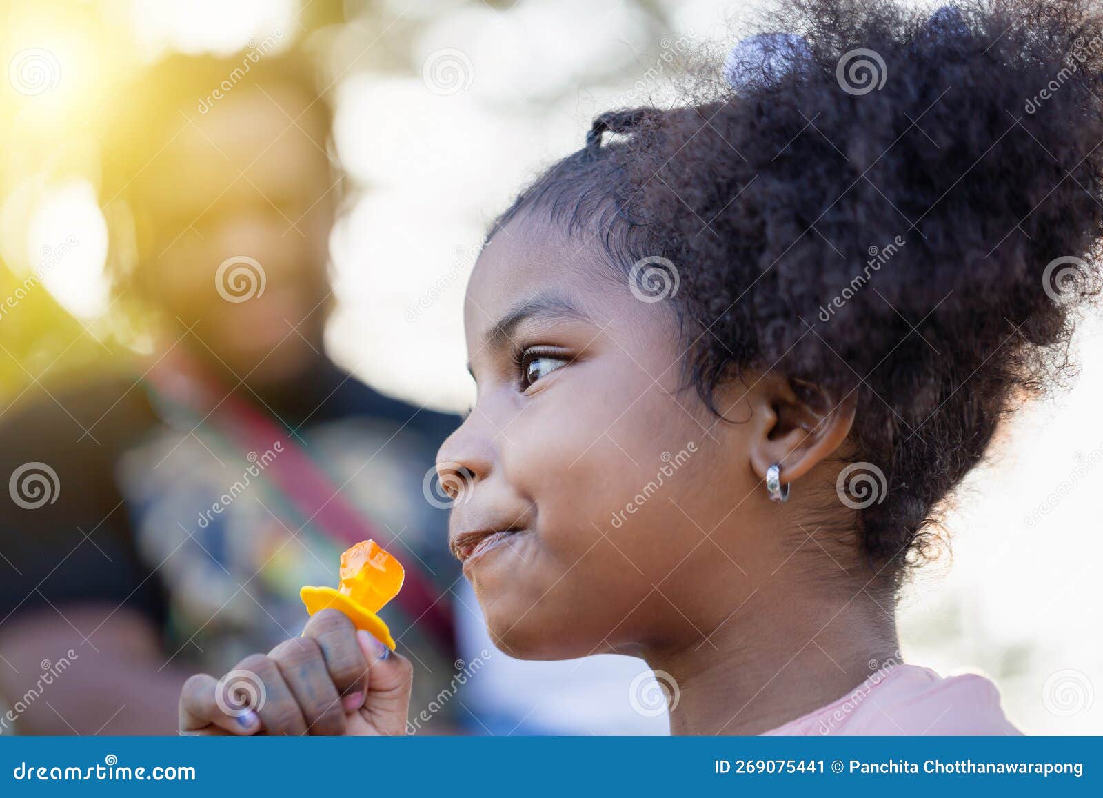 Kid with Ring Pop Candy in Park, Girl Enjoy with Ring Candy Pops Stock ...
