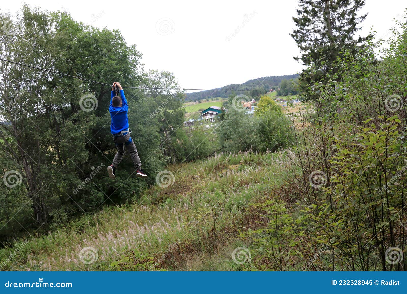 Kid Rolling on Zipline in Forest Stock Image - Image of extreme, cable ...