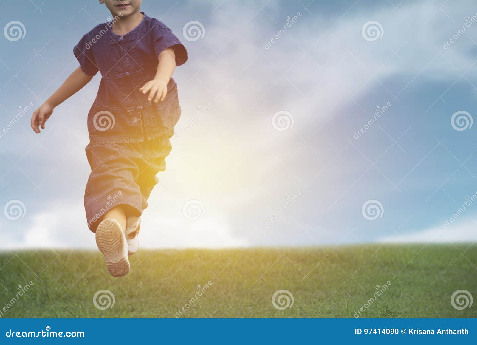 Kid Running and Playing Have Fun and Joy at the Grass Field Stock Photo ...