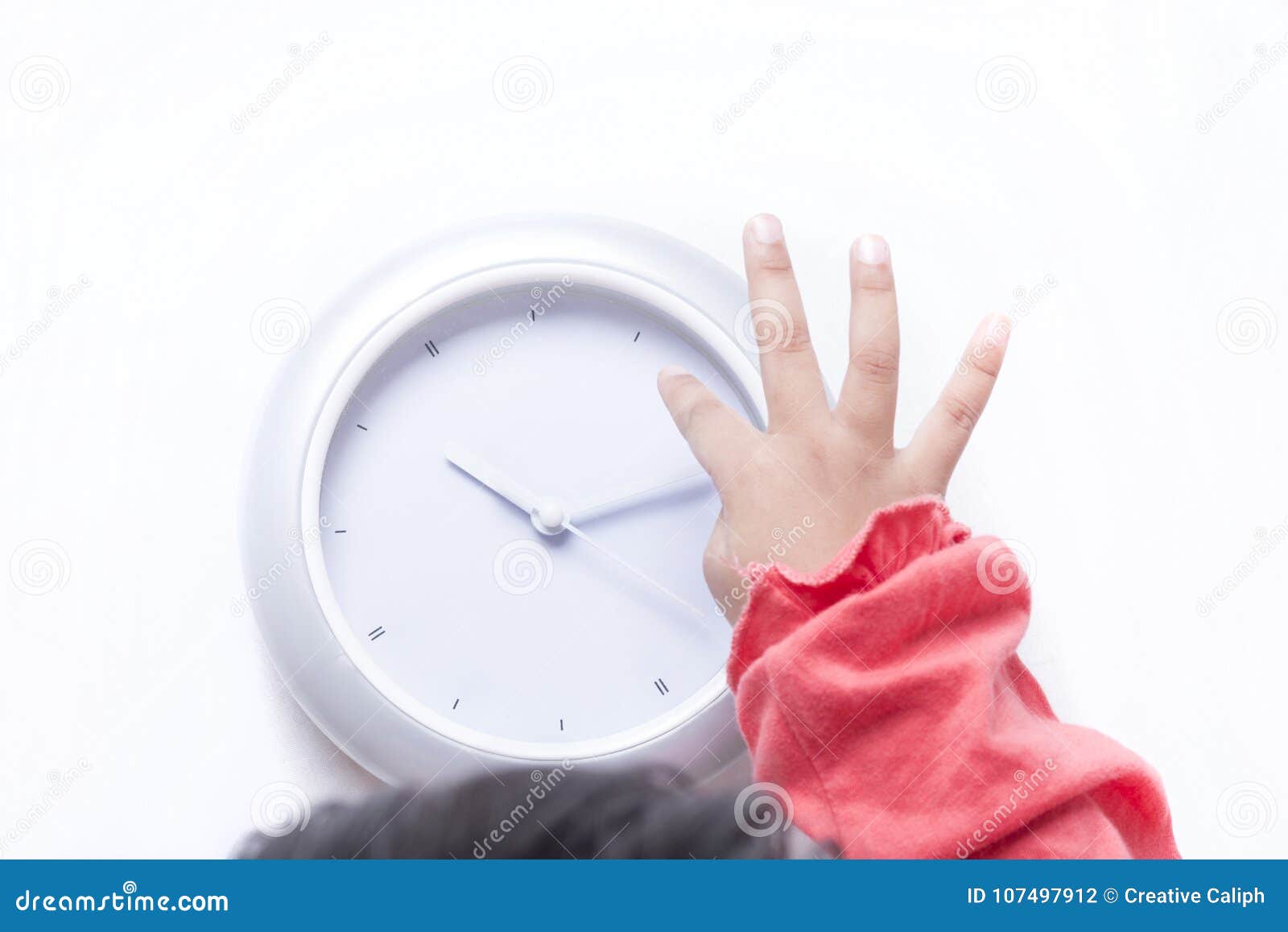 Kid`s Fingers Pointing Towards the Digital Clock. Stock Photo - Image ...
