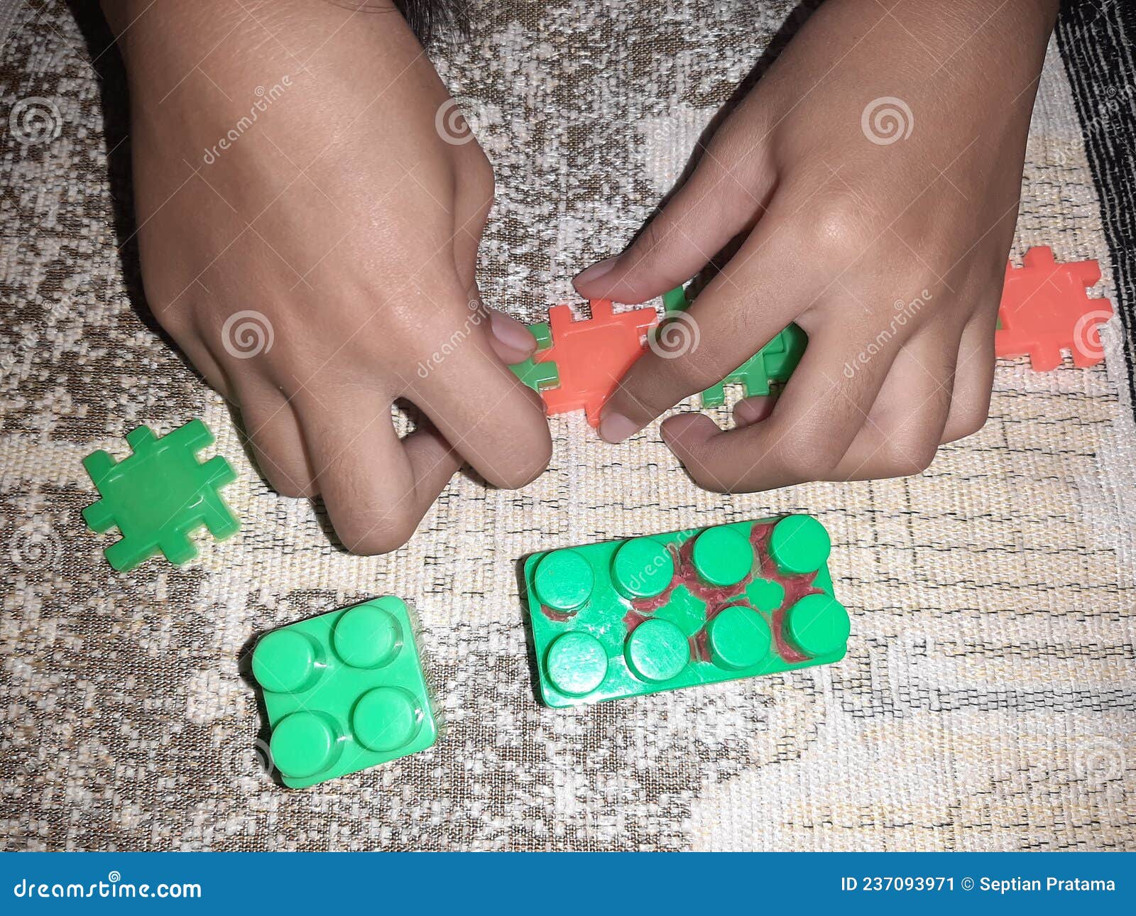 Kid Hand Playing with Puzzles Stock Image - Image of puzz, kids: 237093971